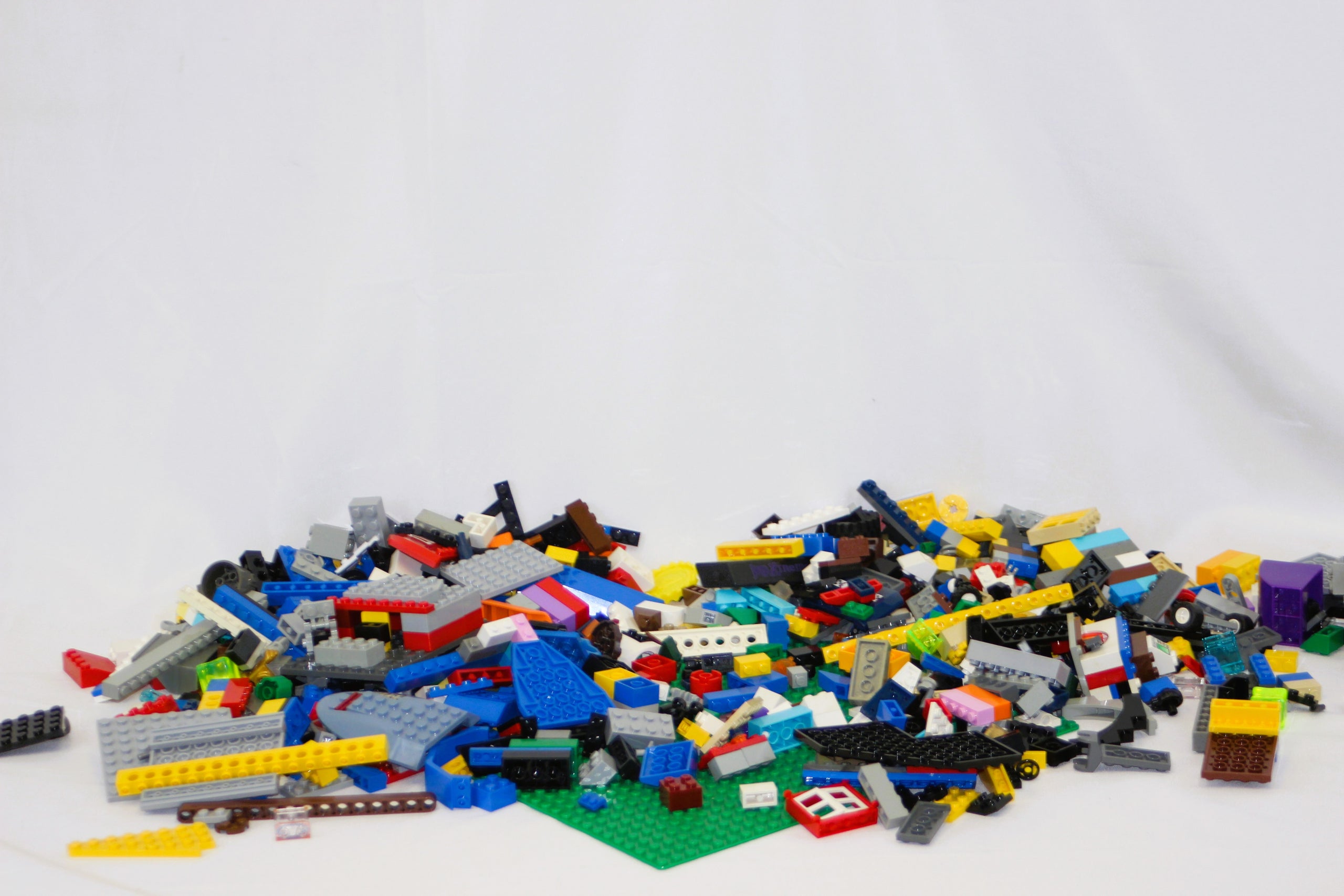 Large Lot Of Building Blocks With Green Platform Base | Goodwill Niagara